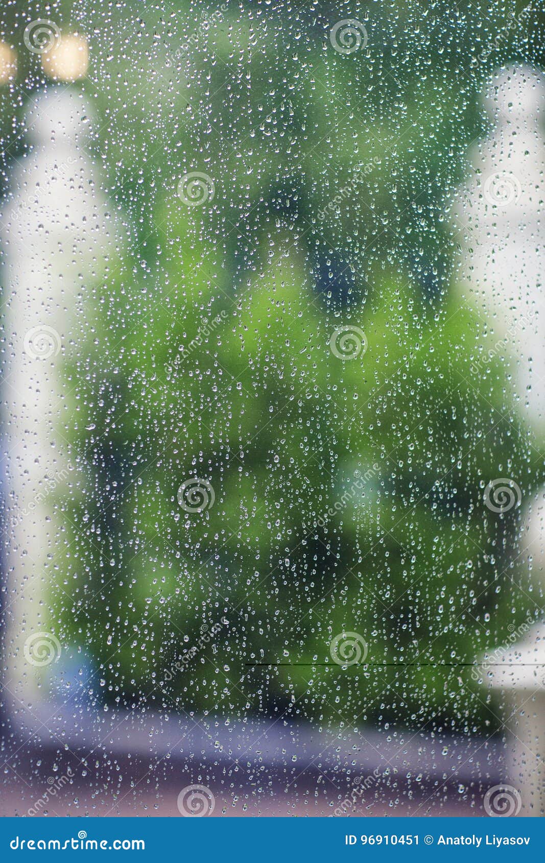 Raindrops on a windowpane stock image. Image of brightly - 96910451