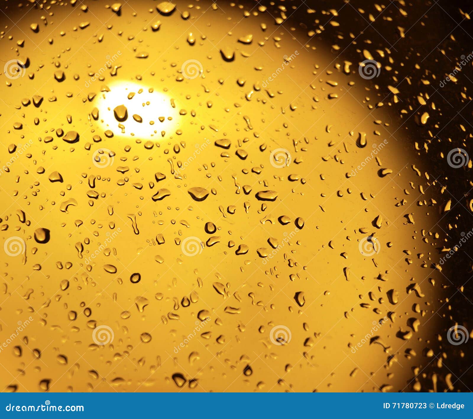 Raindrops with Yellow Light Stock Image - Image of water, yellow: 71780723