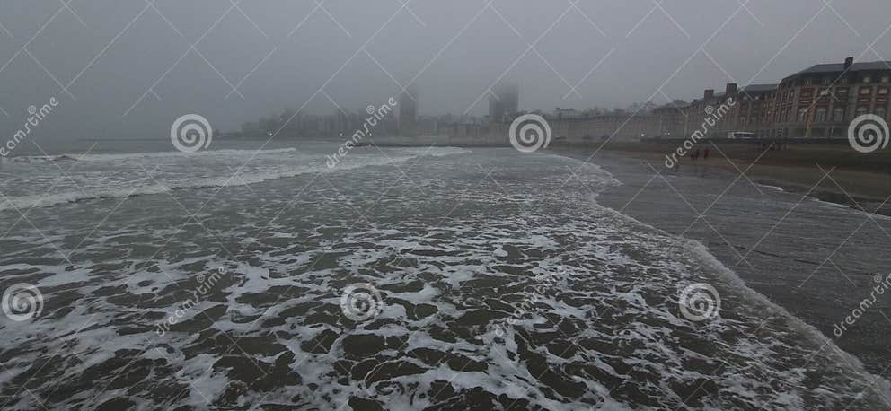 Raining in the beach stock photo. Image of beach, coast - 255156600