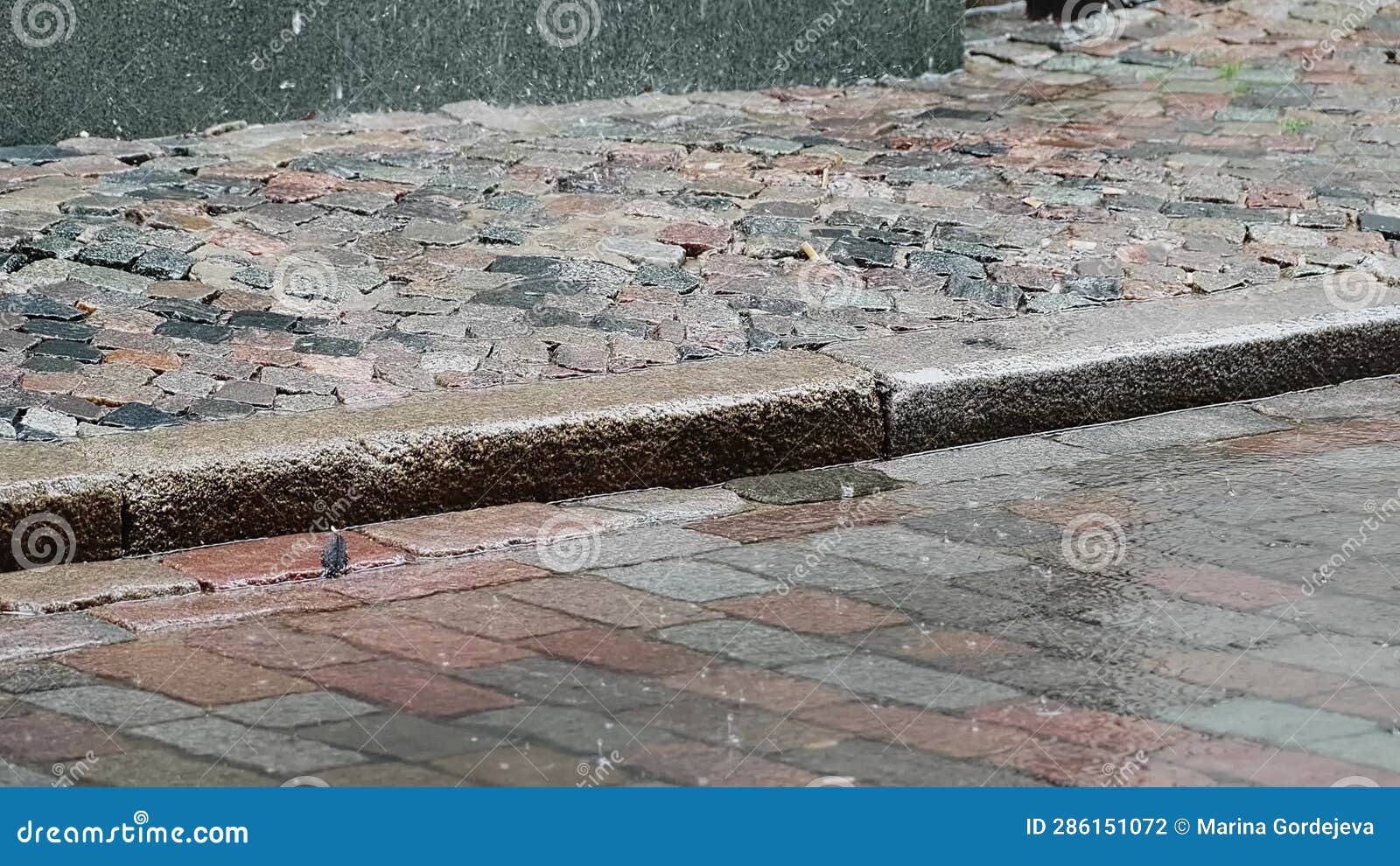 It is Raining on the Ground. Rain Falls on the Cobblestones Creating ...