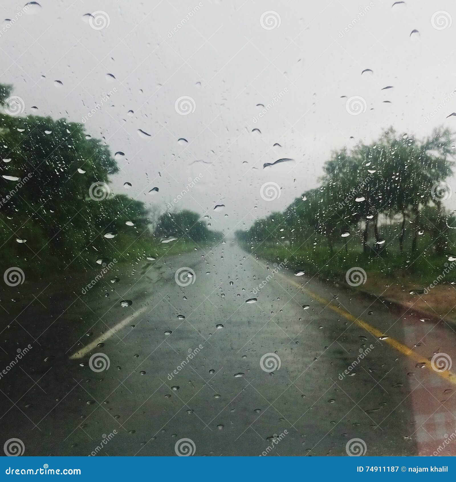 Raining on highway stock image. Image of road, long, raining - 74911187