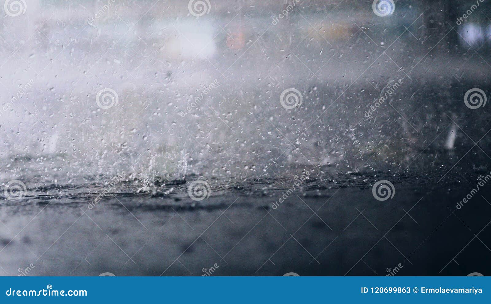 It is Raining Outside. Rain Drops Break in a Puddle Stock Image - Image ...