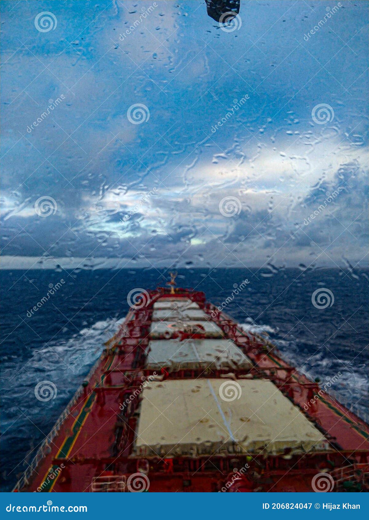Raining Over the Ship in Mid Ocean Stock Image - Image of blue ...