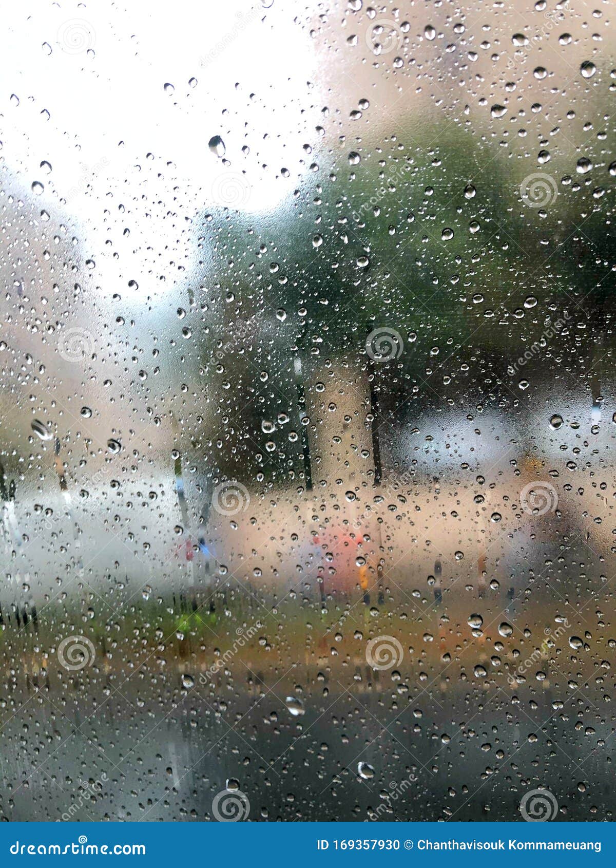 Raining stock photo. Image of rainingglass, falling - 169357930