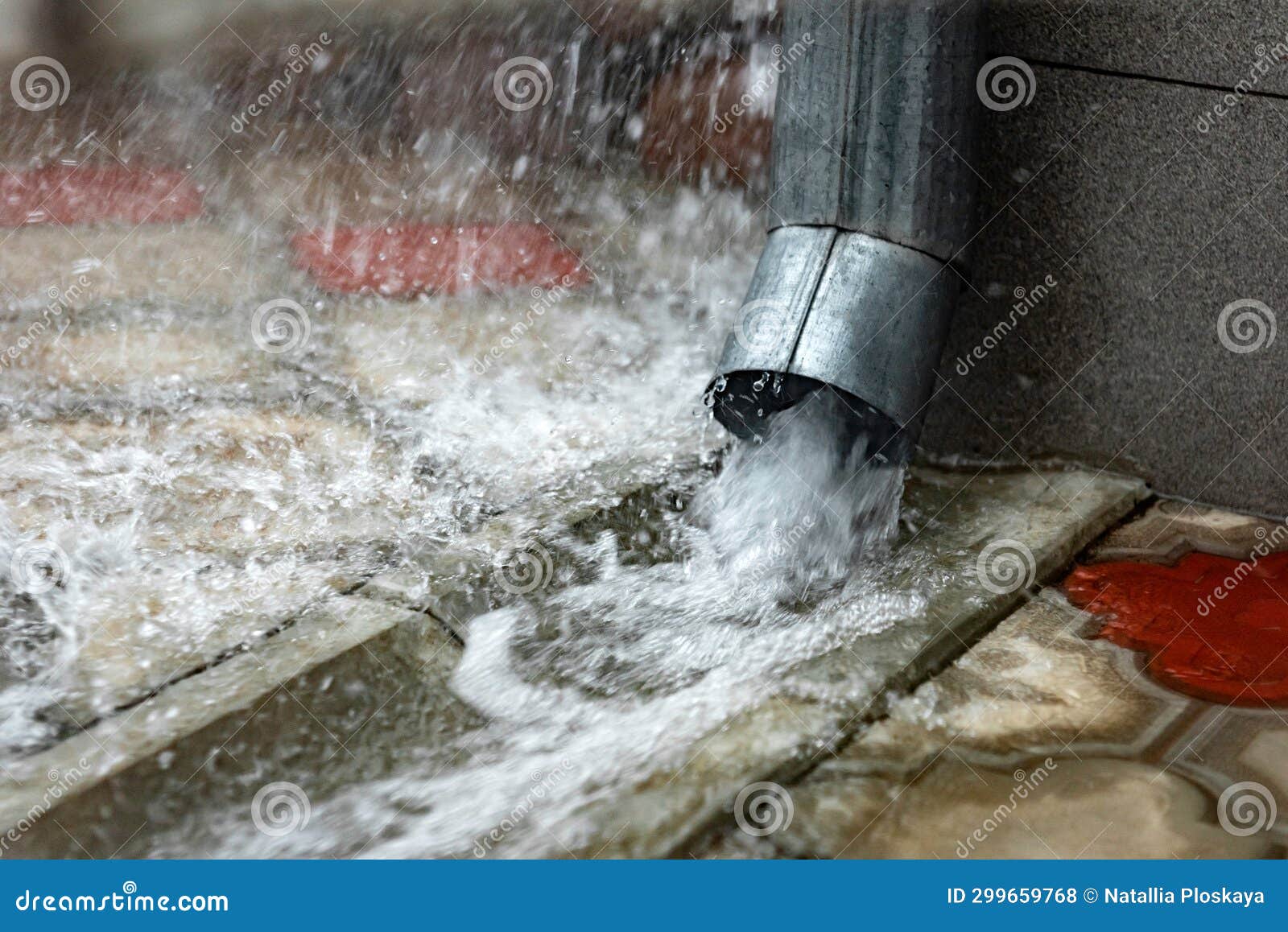 Rainwater Flows from the Gutter during a Heavy Rain. Stock Photo ...