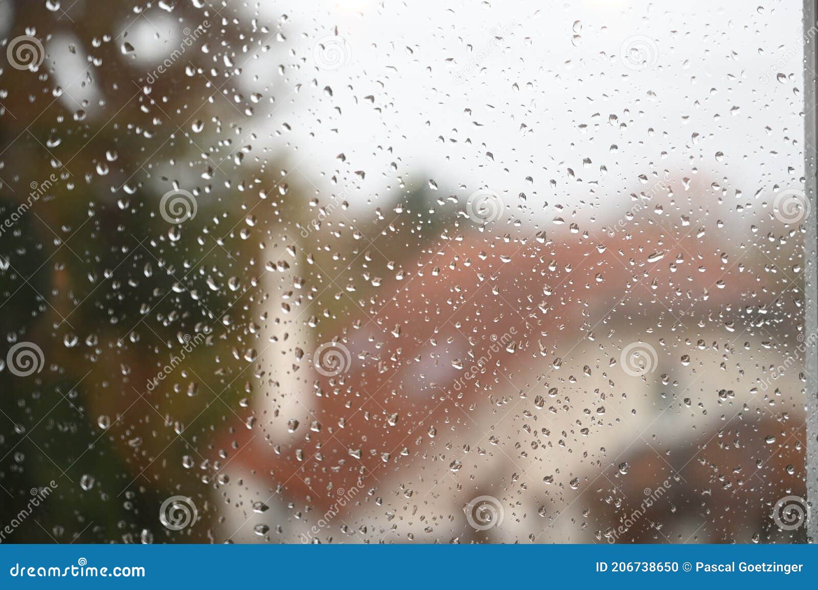 Water Drops on a Window with a House in the Background Stock Photo ...