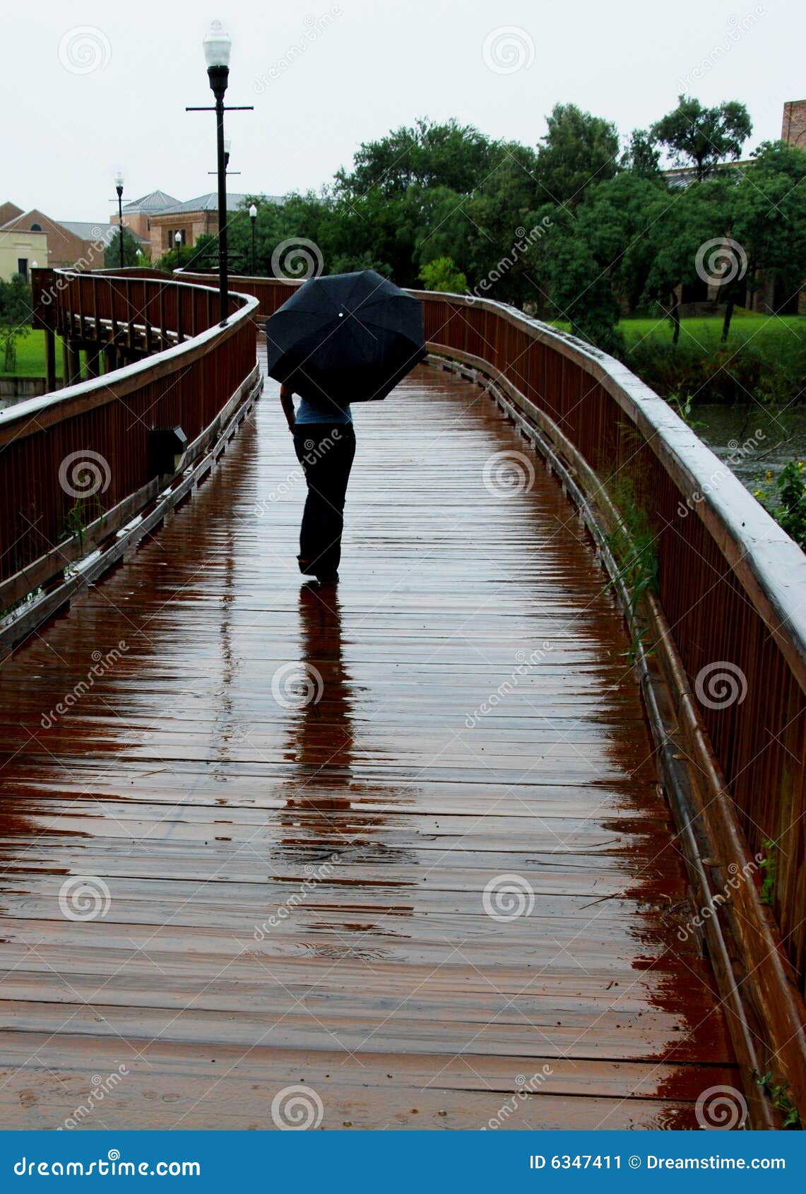 Rainy day on bridge stock image. Image of dark, railing - 6347411