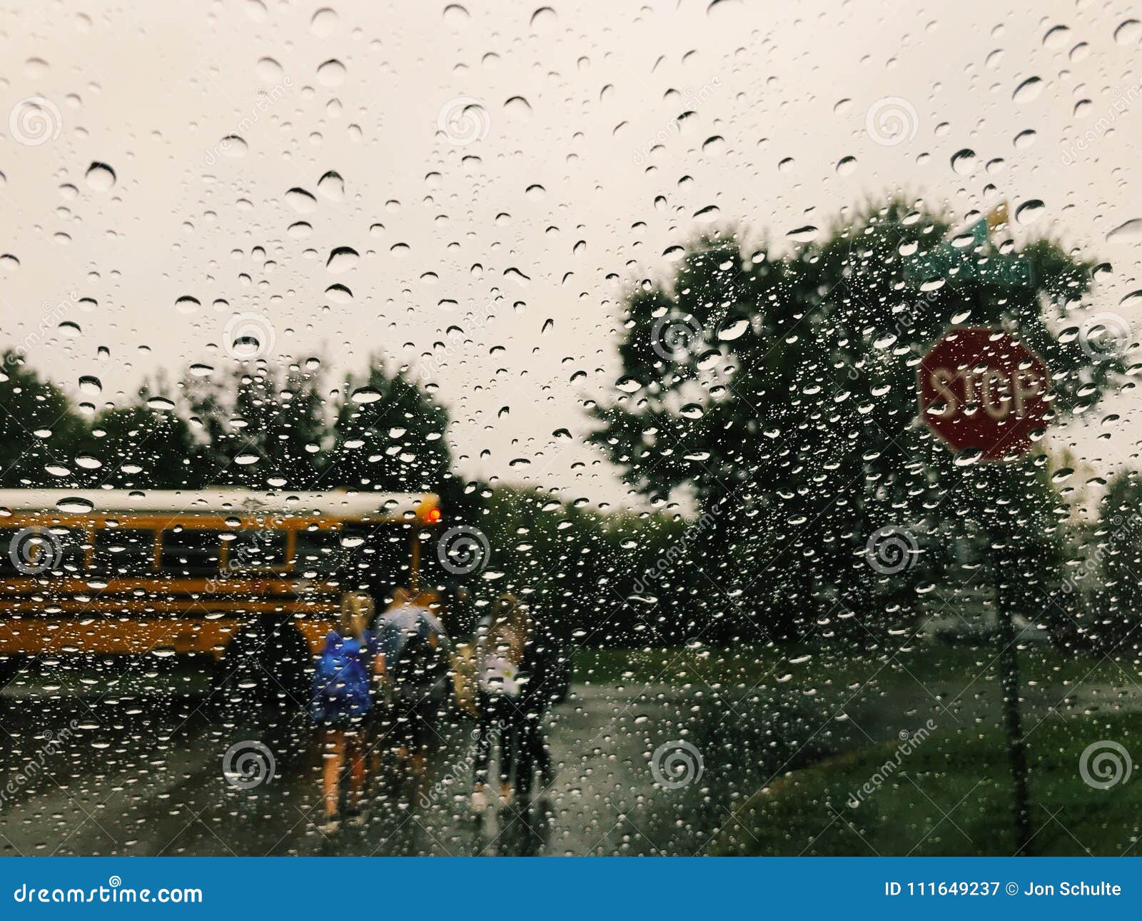 Rainy day bus stop stock image. Image of liquid, children - 111649237