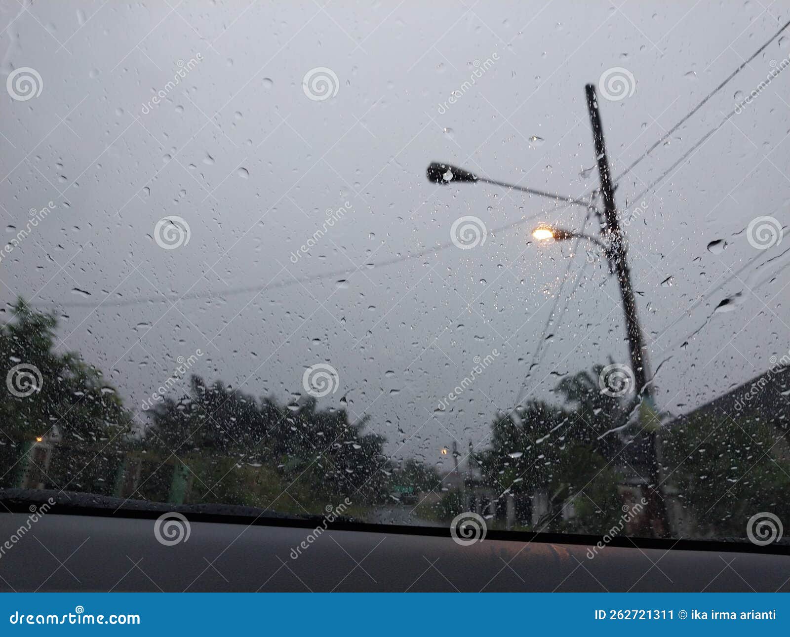 Rainy day night stock image. Image of line, winter, streetlight - 262721311