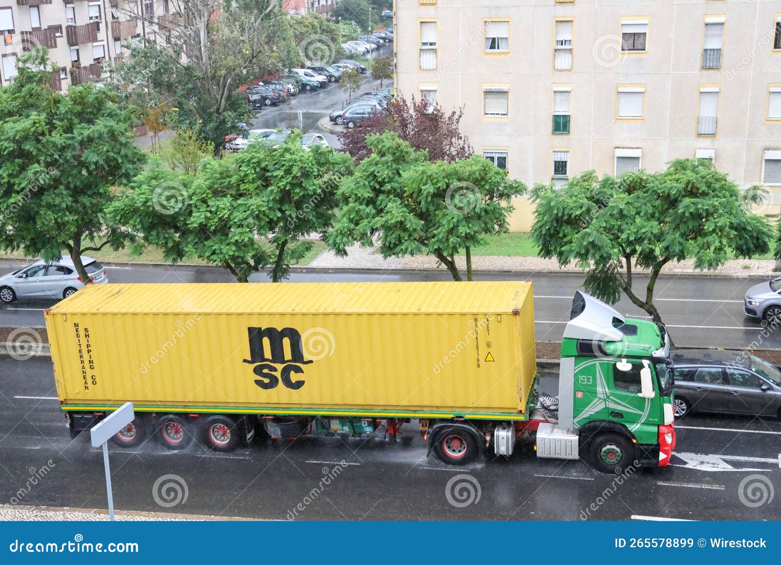 Rainy Day and a Truck with a Yellow Container on the Road Editorial ...