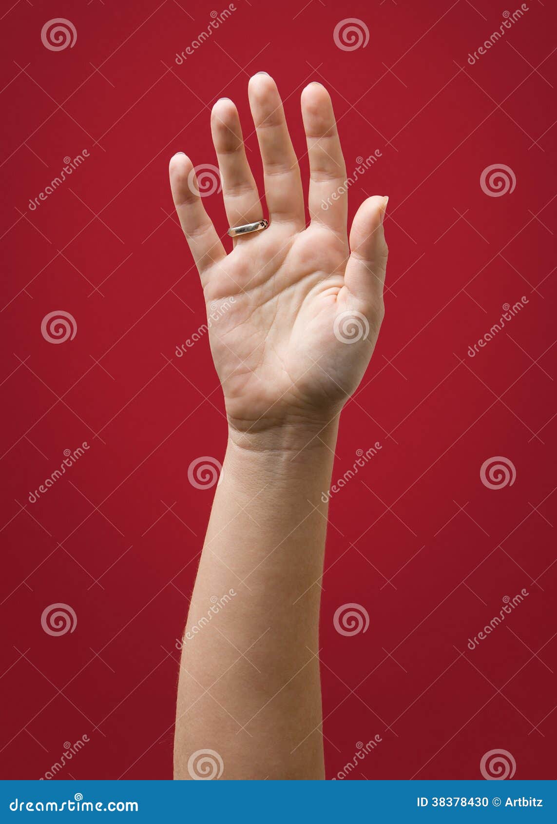 Raised Female Hand Wearing Ring Stock Photo - Image of closeup, gesture ...