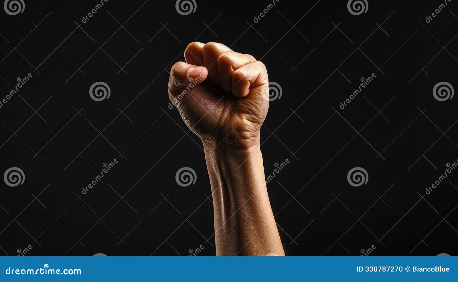 Raised Fist in Front of Black Background AIG535 Stock Photo - Image of ...