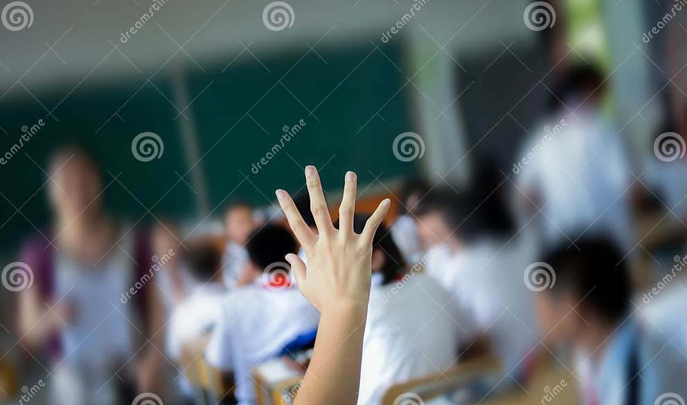 Raised Hand in Class of School Stock Photo - Image of finger, hand ...