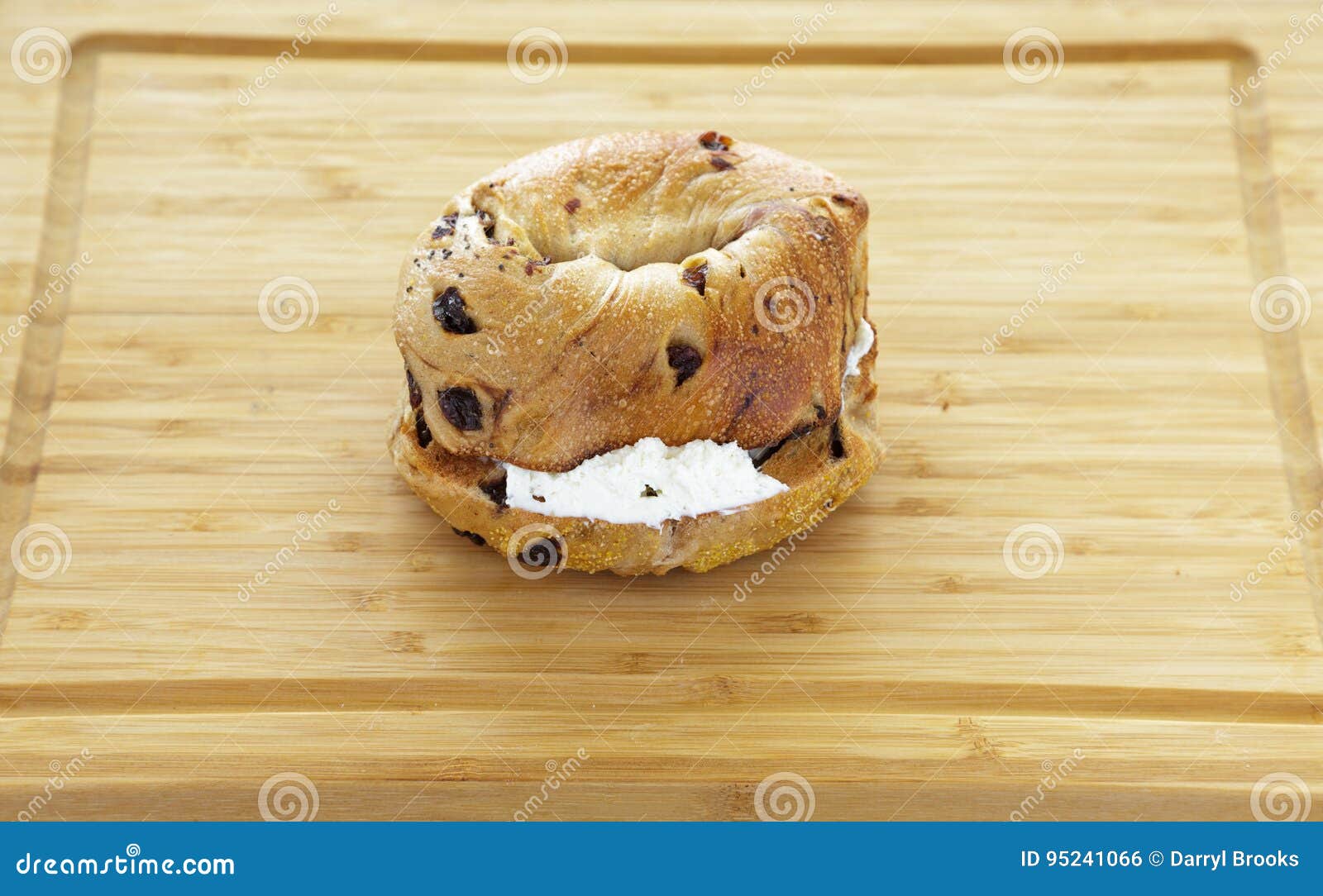 Raisin Bagel with Cream Cheese Stock Photo - Image of grain, cinnamon ...