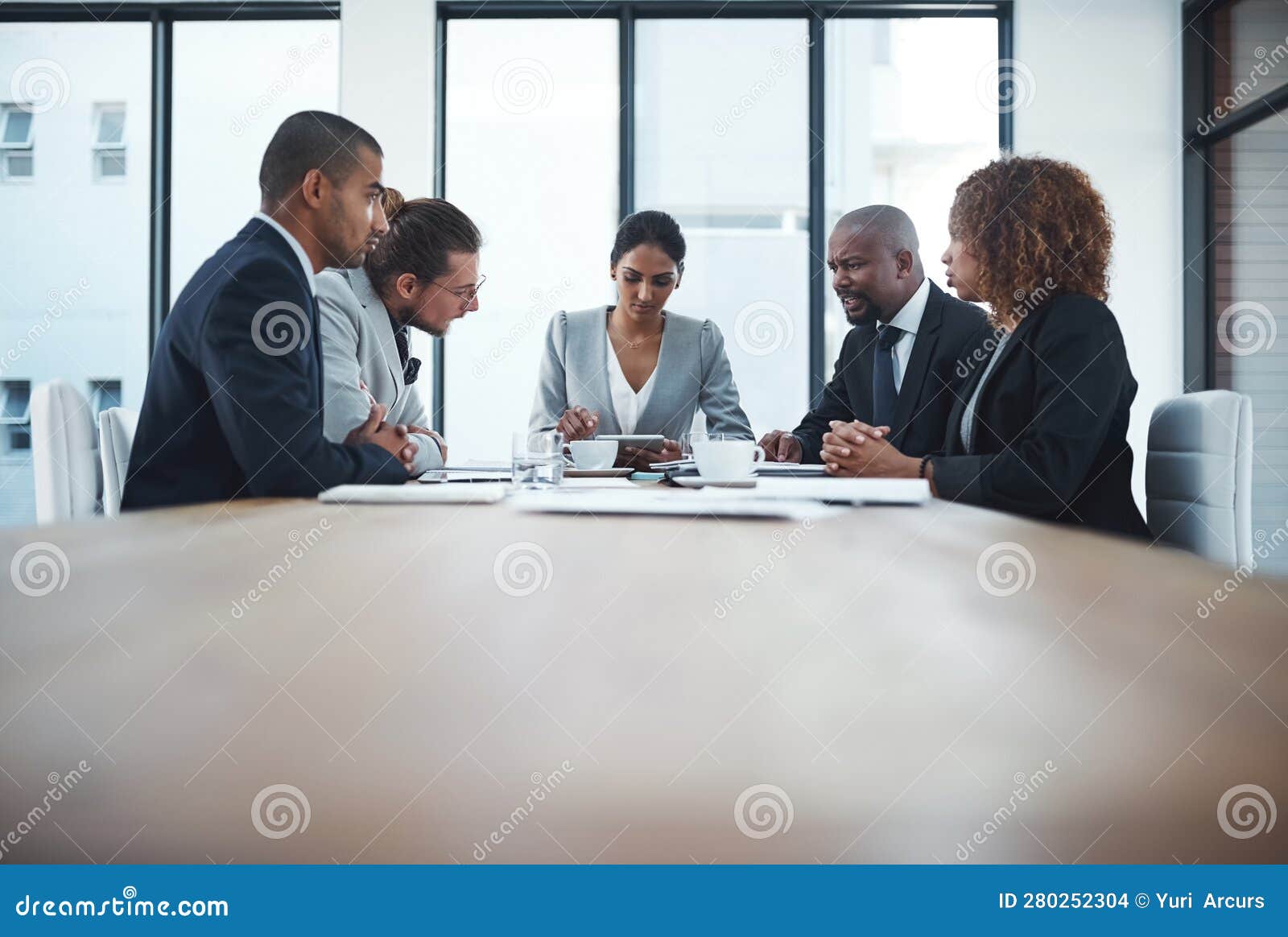 Raising Potential Problems in the Meeting. a Group of Businesspeople ...