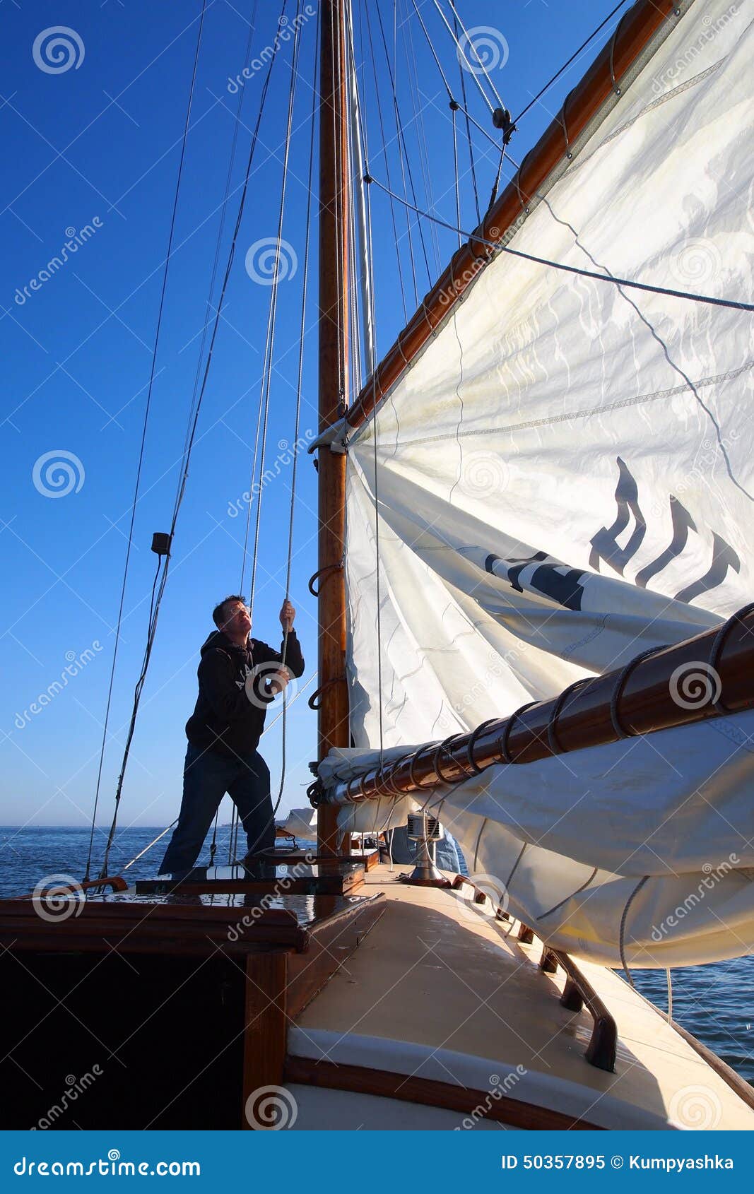 Raising Sail Wooden Boat Man Stock Photos - Free & Royalty-Free Stock ...