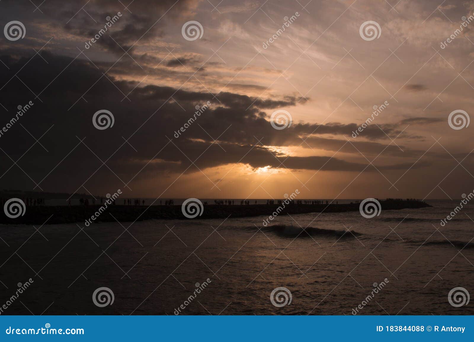 A Raising Sun and Dramatic Sky and Clouds Formation Stock Photo - Image ...
