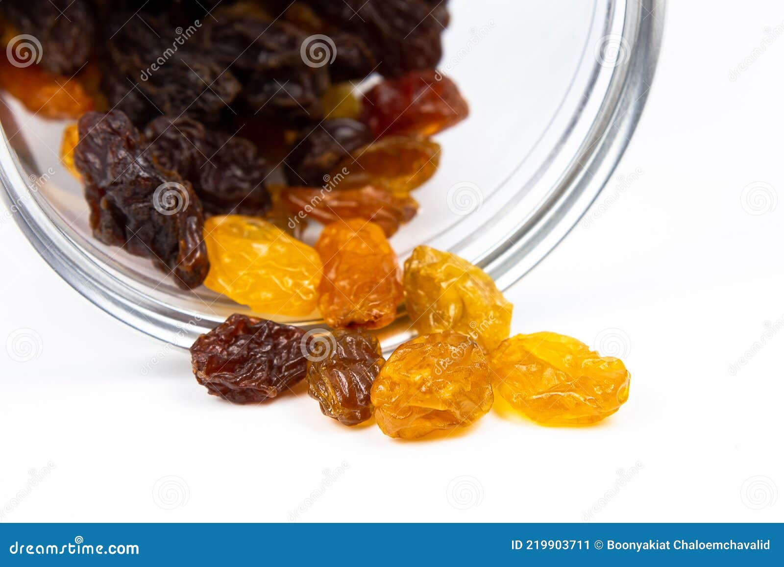 Raisins and Golden Raisins in Plastic Jar on White Background. Food ...