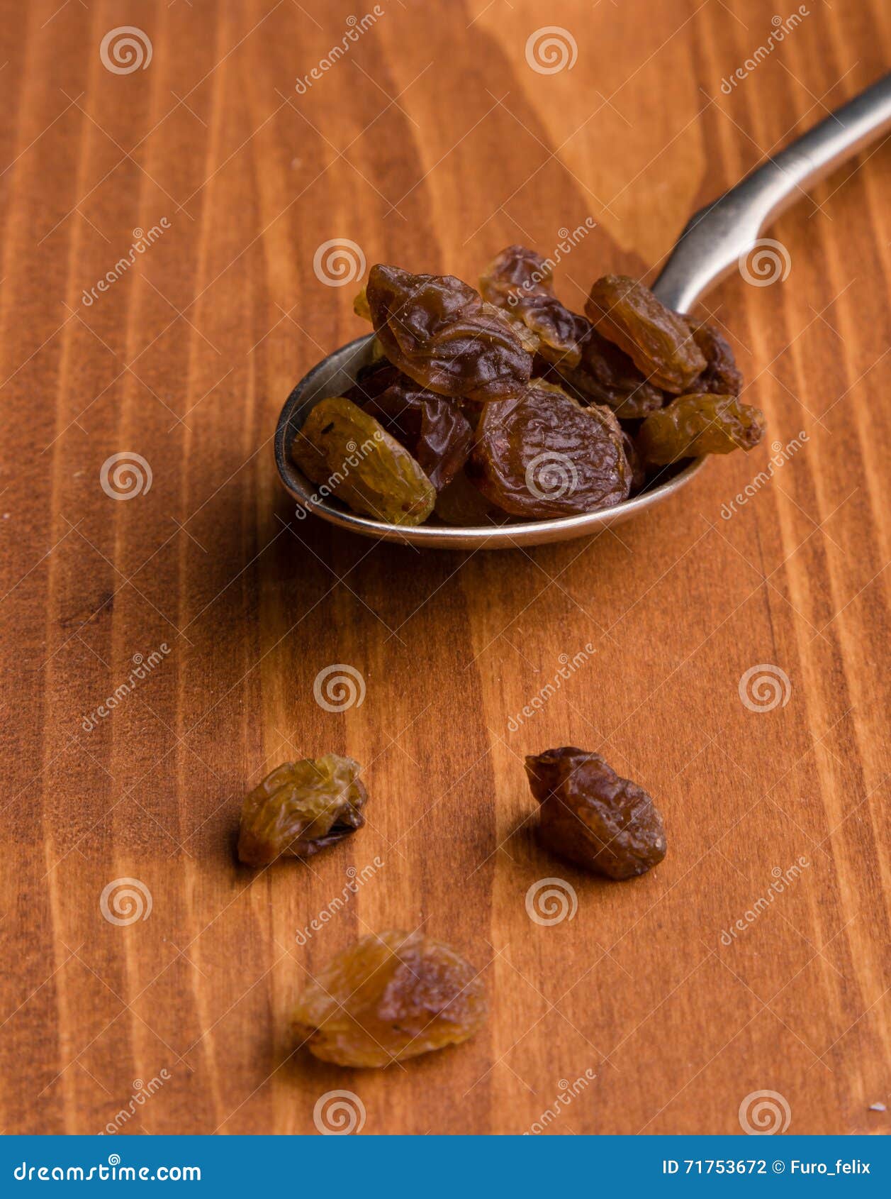 Raisins on spoon stock photo. Image of grape, dark, spoon - 71753672