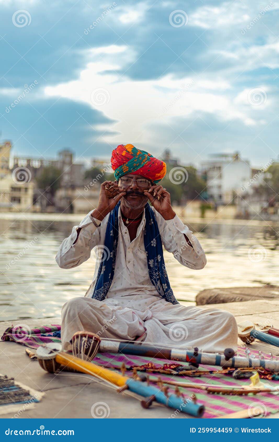 Rajasthani Man Sitting on a Shore with a Musical Instrument Editorial ...