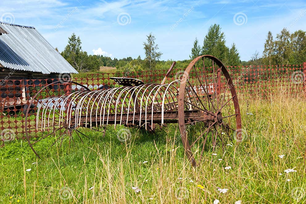 Rake hay in agriculture stock photo. Image of meadow - 26729724