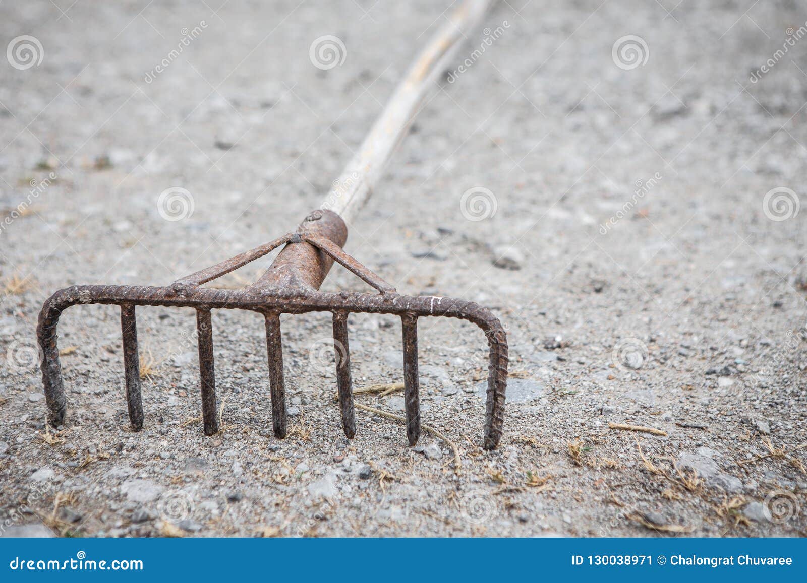 The rake is rusty stock image. Image of landscape, background - 130038971