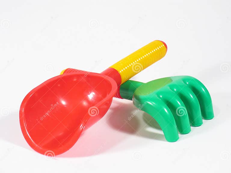 Rake and Shovel crossed I stock photo. Image of child, rakes - 17300