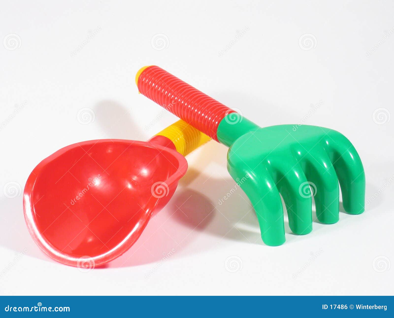 Rake and Shovel crossed II stock photo. Image of plastic - 17486
