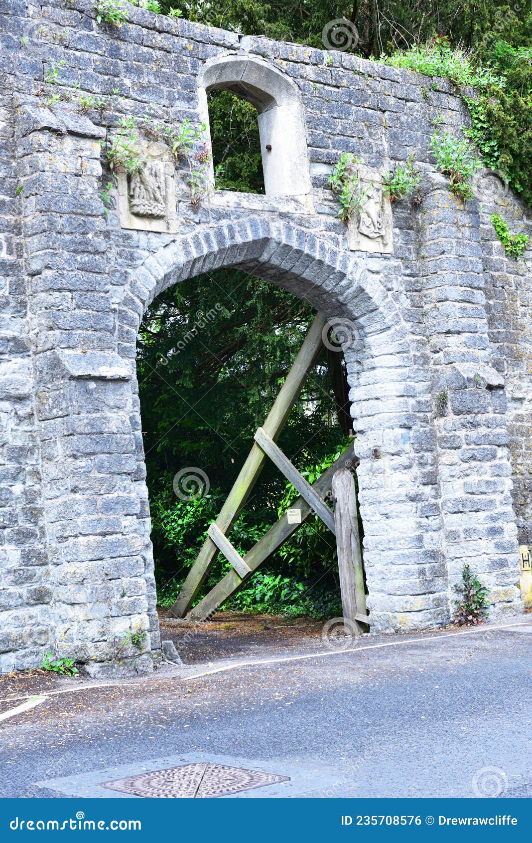 Raking Shore Holding Up the Wall Stock Photo - Image of leaning, opeing ...