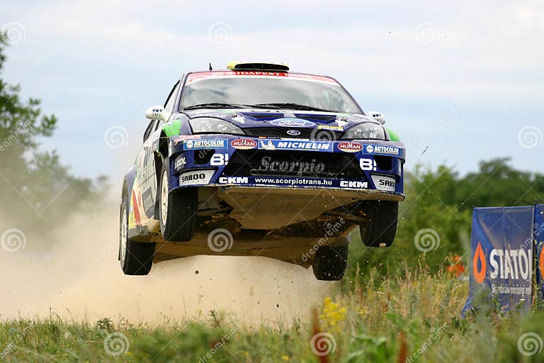 Rally car jumping editorial stock photo. Image of navigator - 4883018