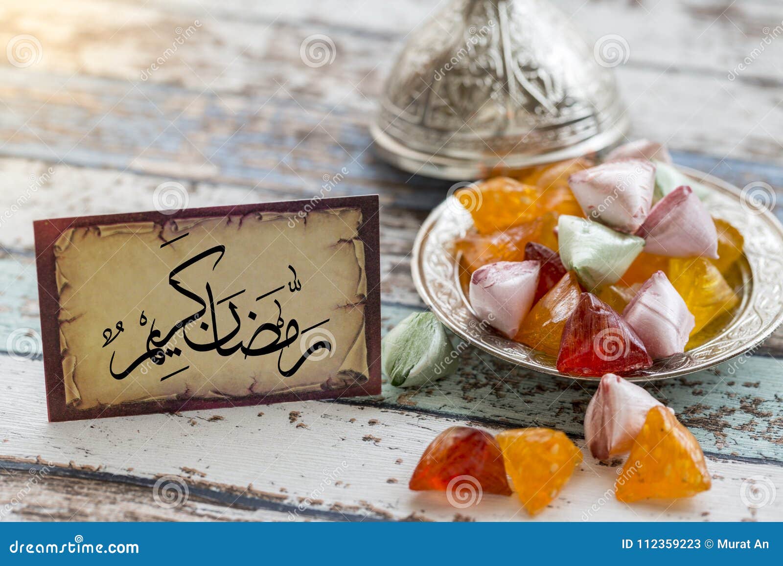 Ramadan Kerim Text in Arabic on Vintage Table with Candies Stock Image ...