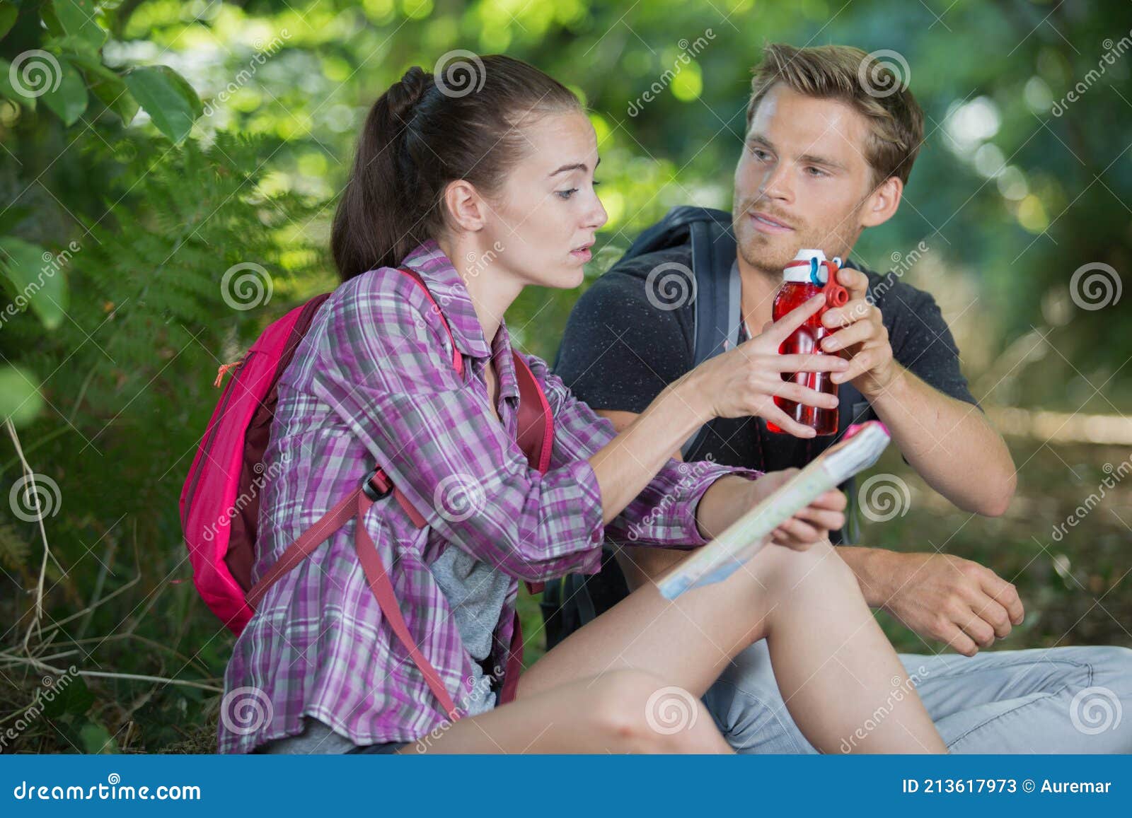 Rambling Couple Resting and Sharing Bottle Water Stock Image - Image of ...
