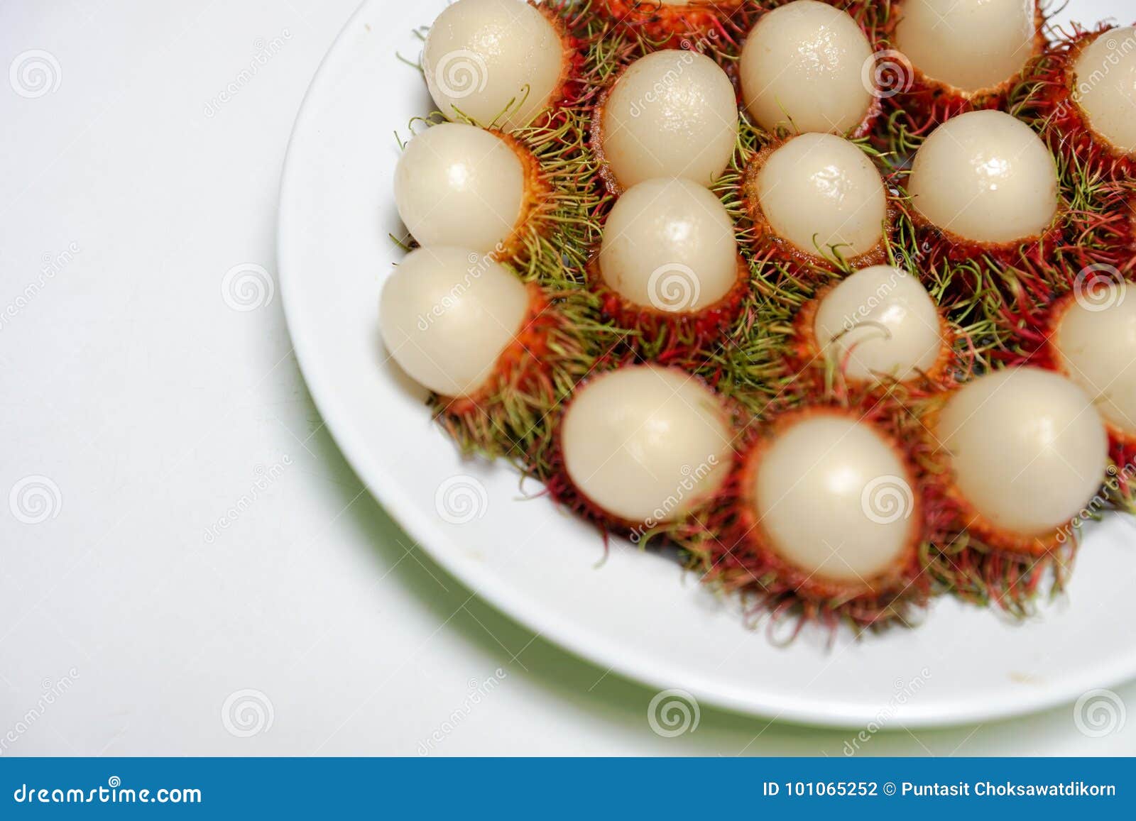 Rambutan in the white dish stock photo. Image of close - 101065252