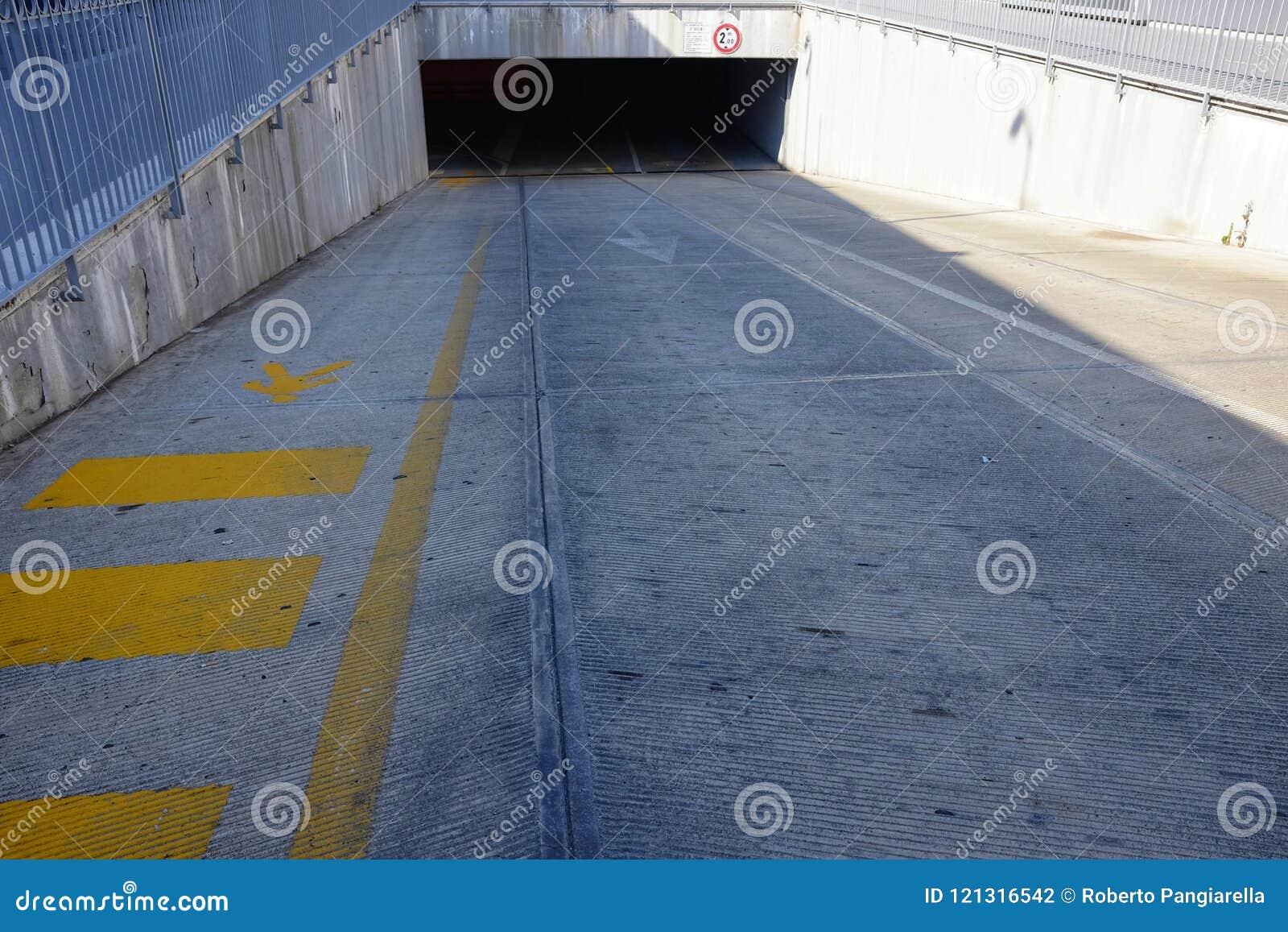 Ramp Access Underground Parking Stock Photo - Image of covered ...
