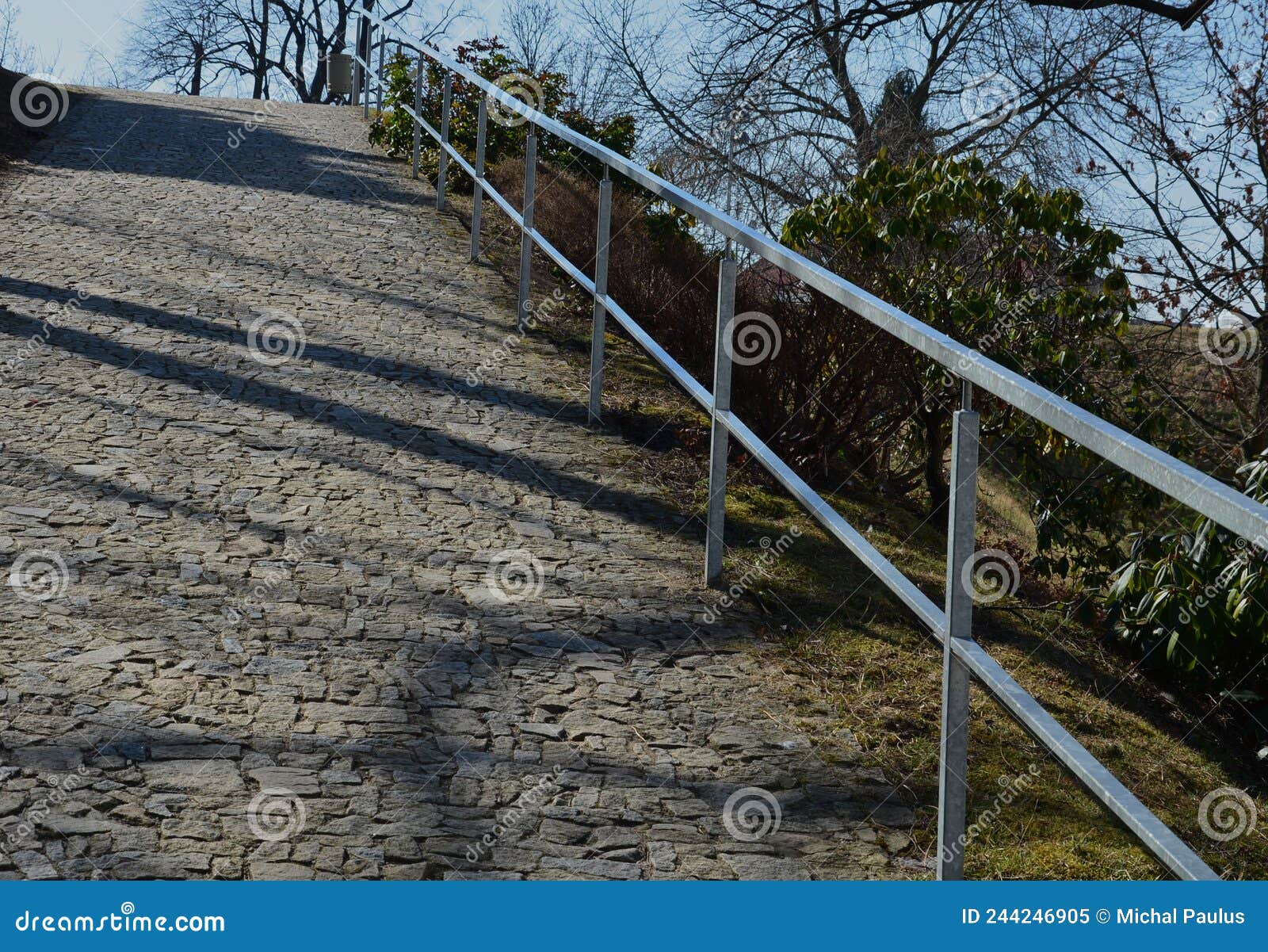 Ramp with Stone Paving Surface. Railing with Galvanized Surface. Park ...