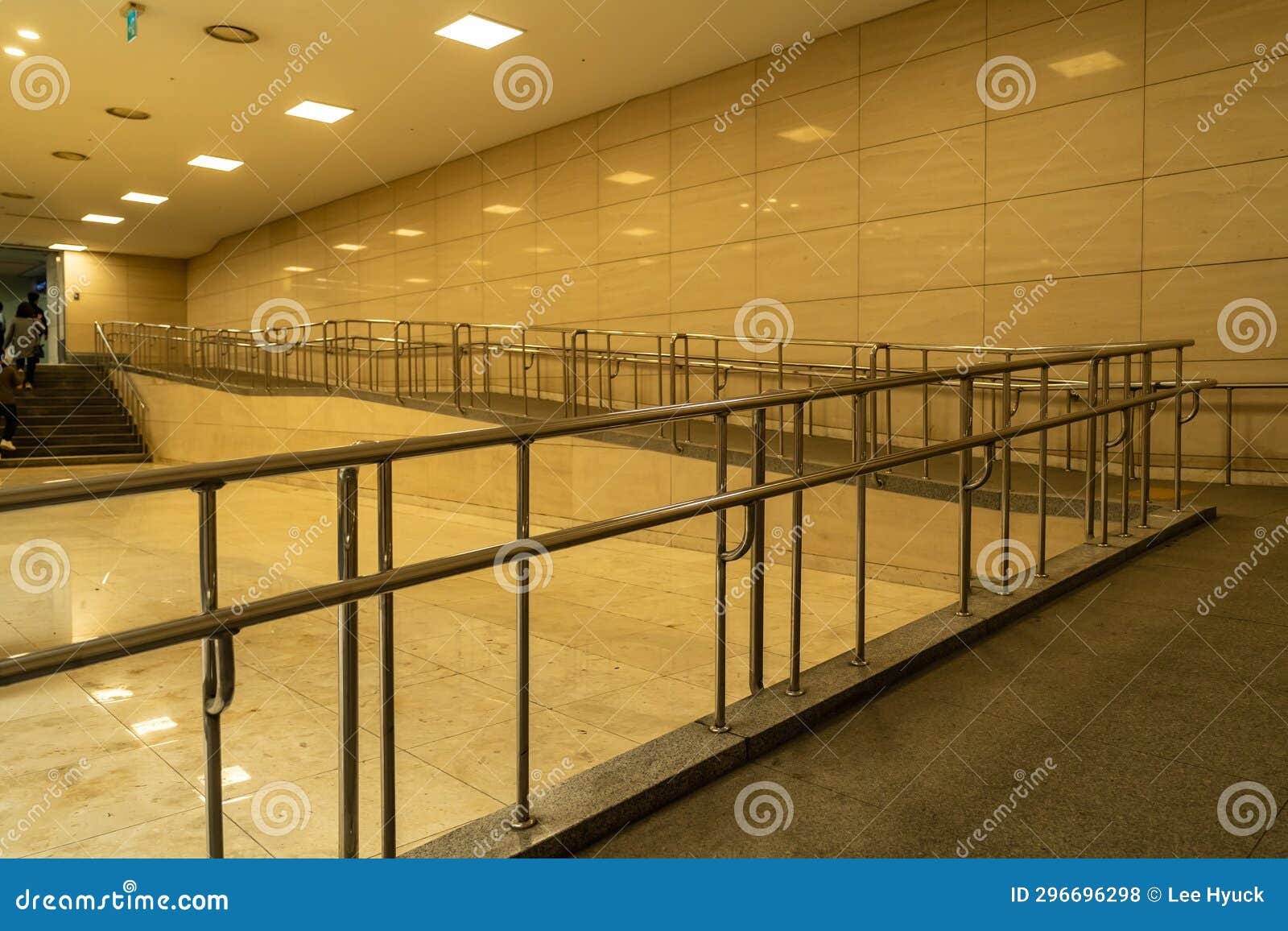 A ramp in a subway station stock photo. Image of physical - 296696298