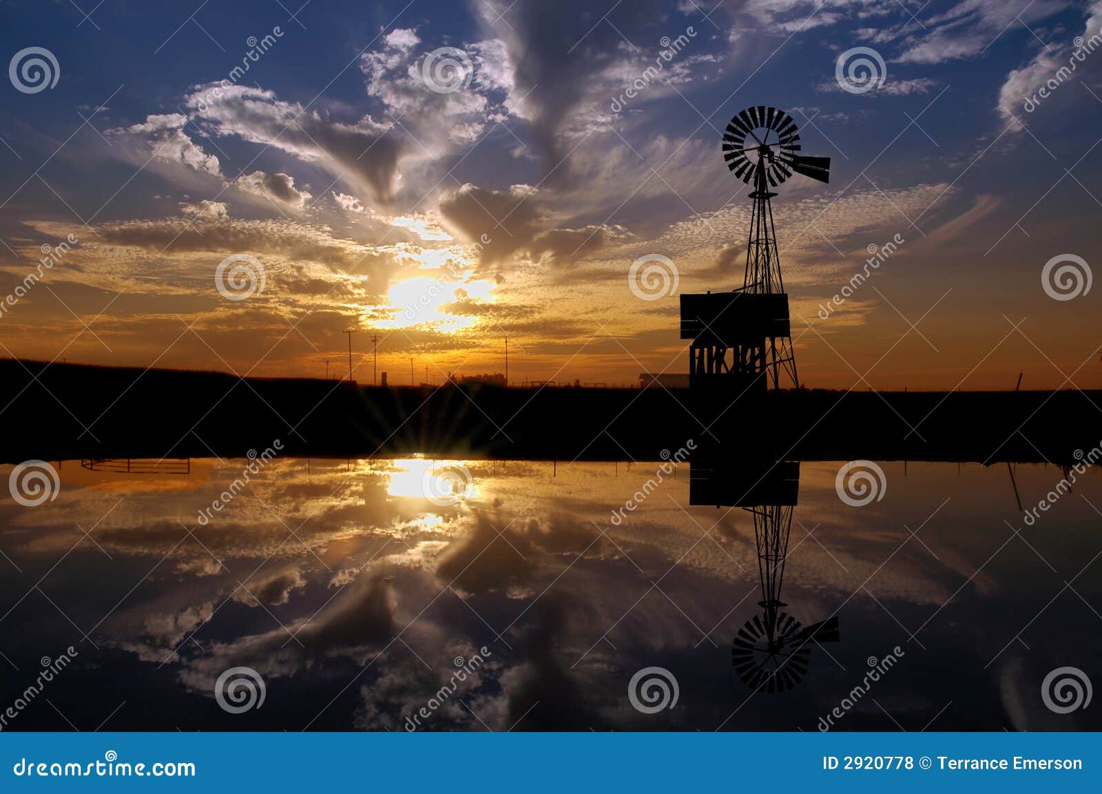 Ranch Windmill at Sunset stock photo. Image of clouds - 2920778