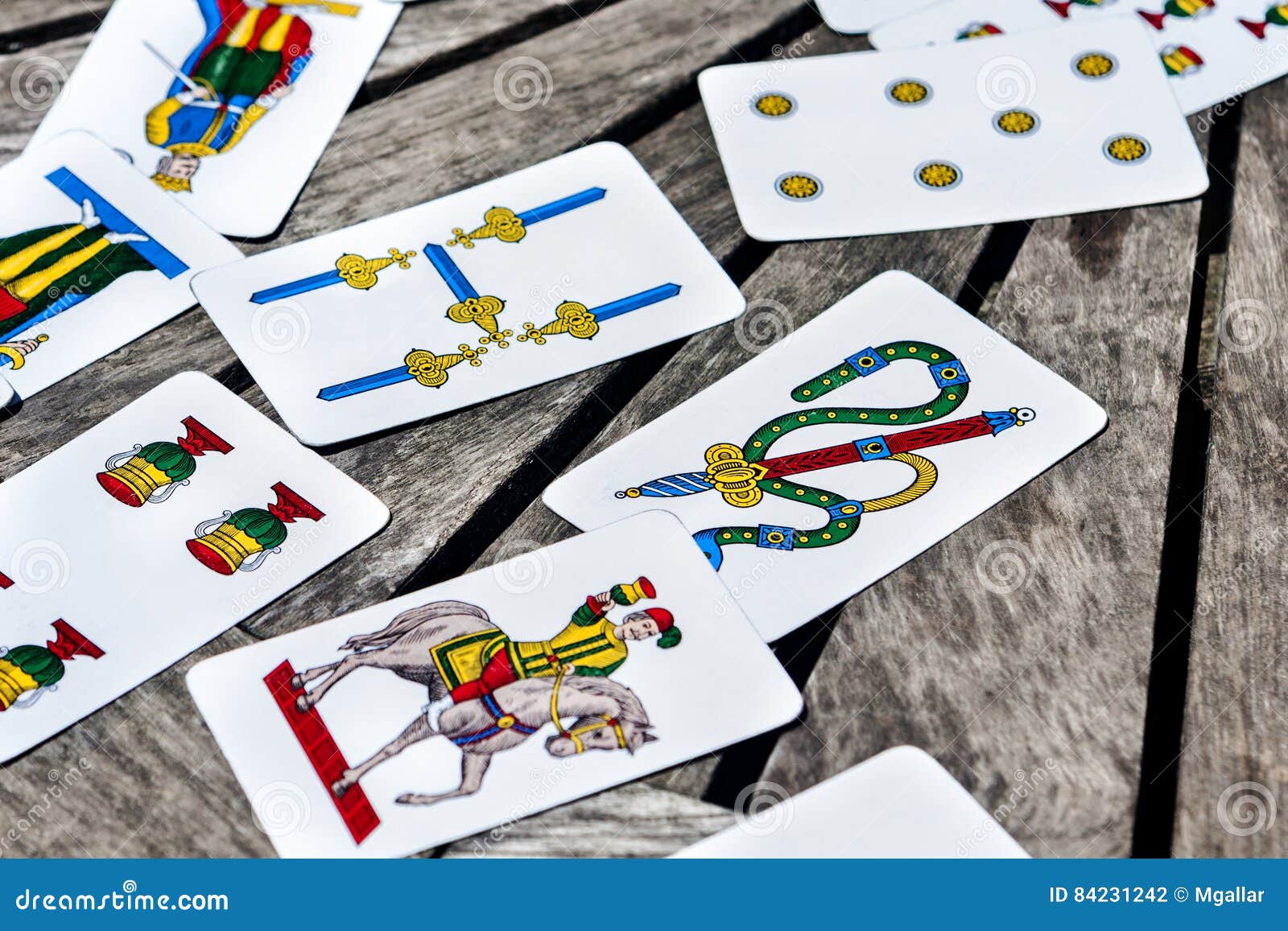 Random Cards on Wooden Table Stock Photo - Image of cups, perspective ...