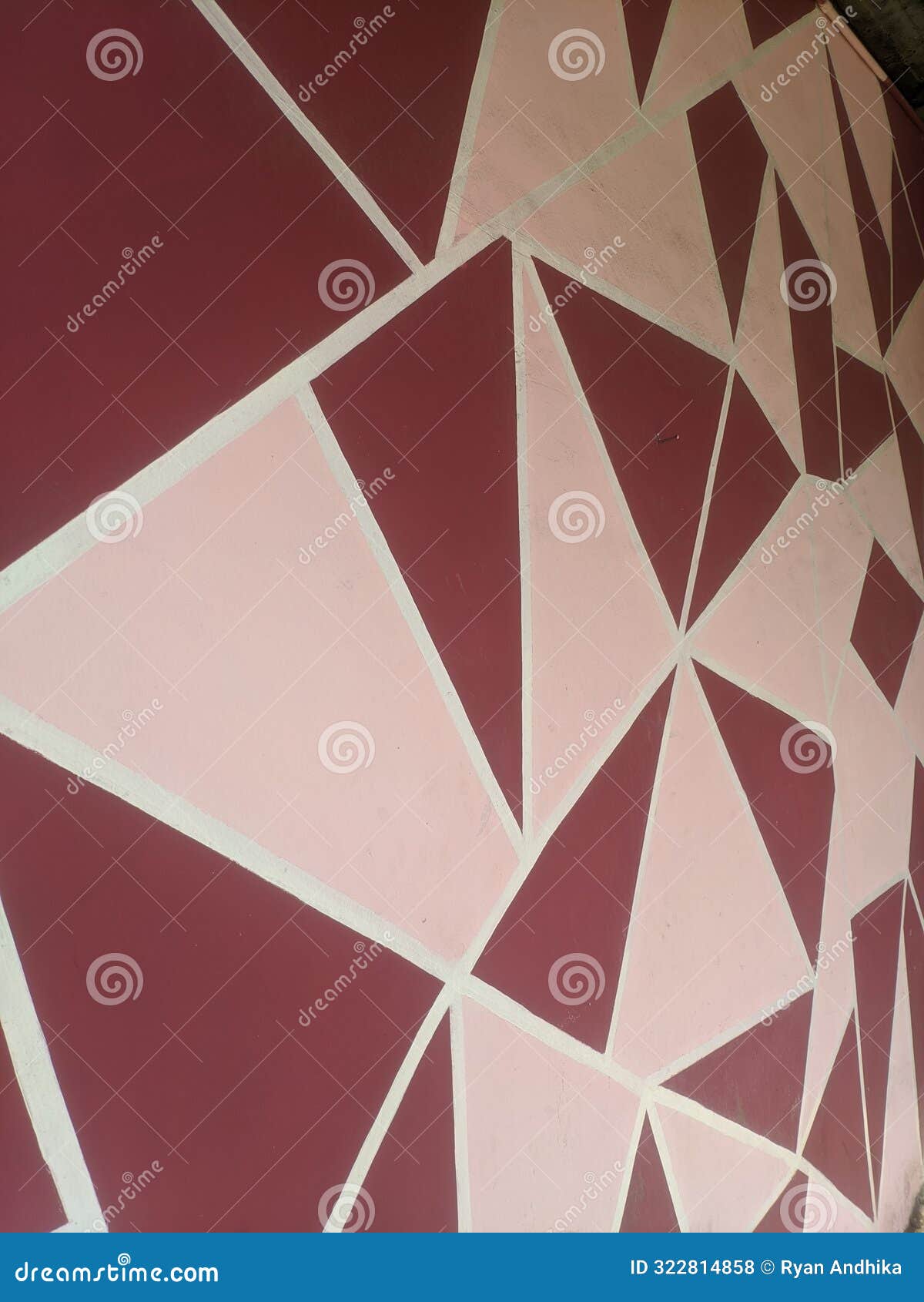 Random Triangle Patterns on the Pink and Maroon Walls Stock Photo ...