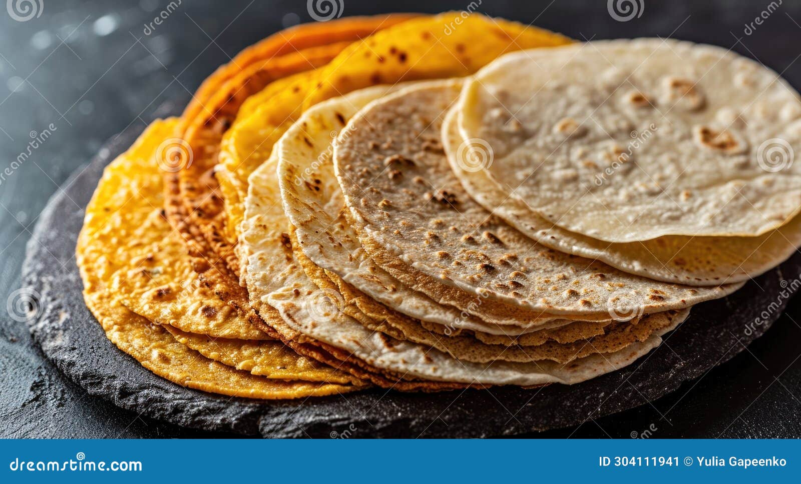 A Range of Different Types of Mexican Tortillas on a Table on Black ...