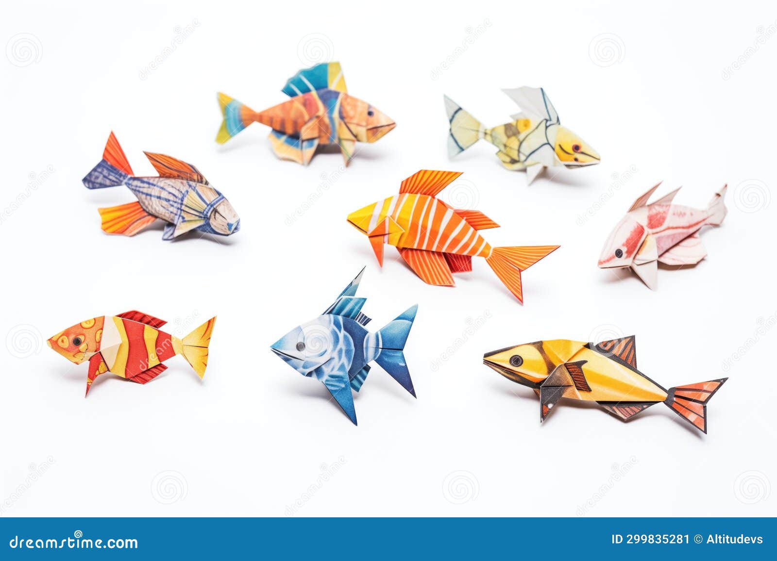 A Range of Different Wet-folded Origami Animals Set on a White Table ...