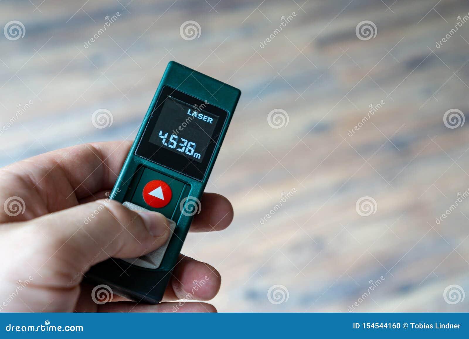 Rangefinder on Laminate Floor - Measurement Device Stock Photo - Image ...