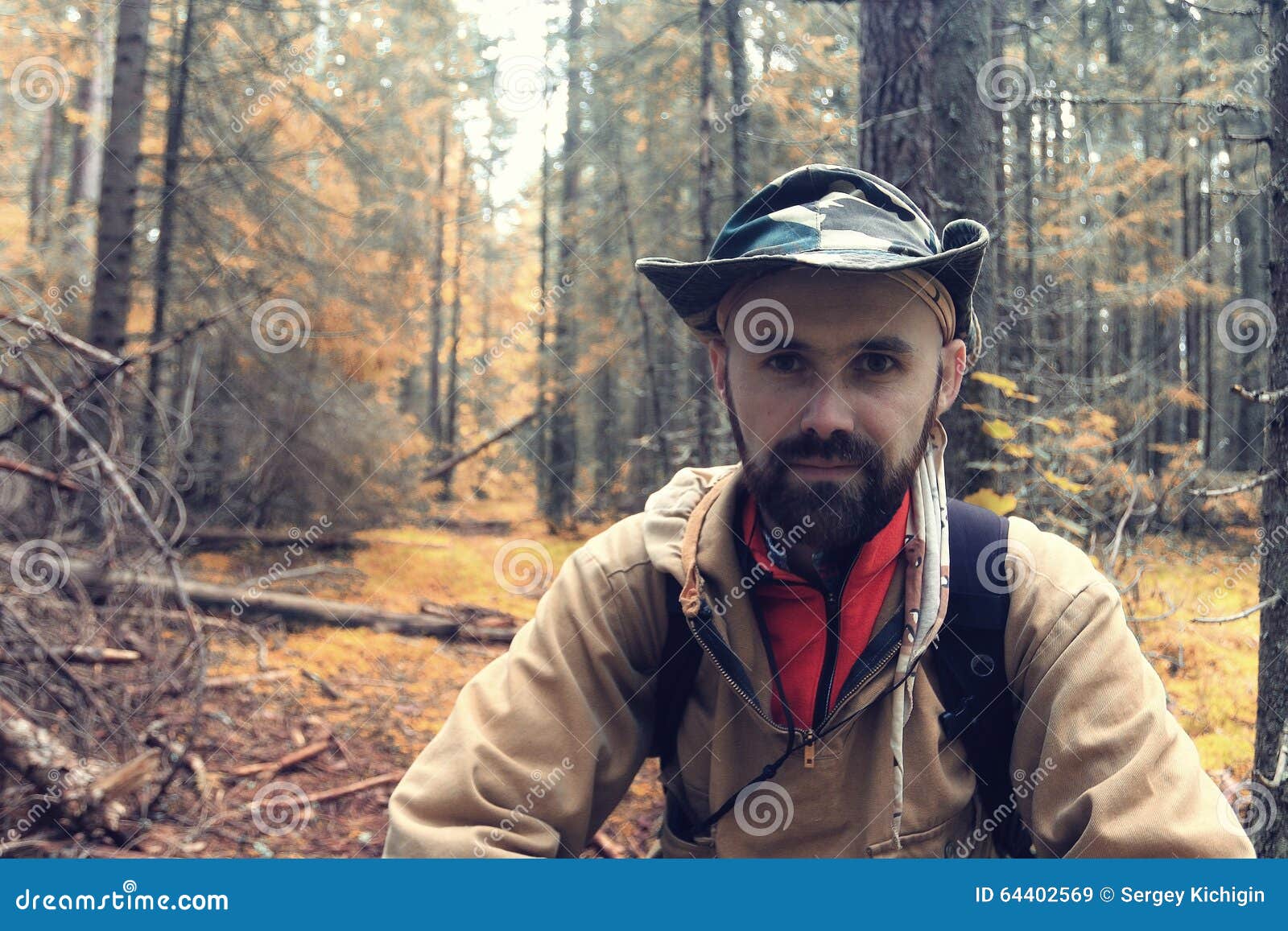 Ranger in autumn forest stock image. Image of forester - 64402569
