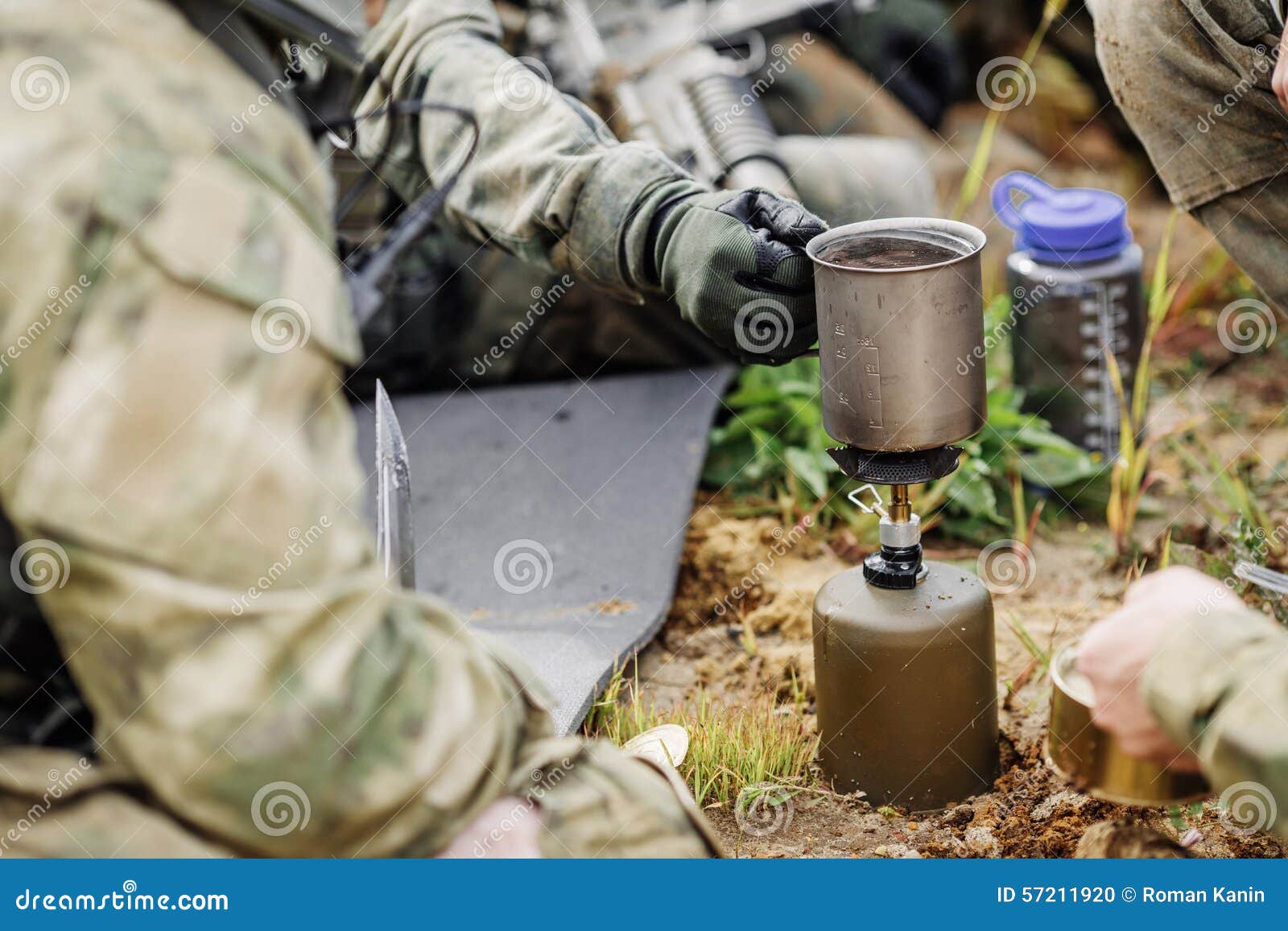 Rangers are Heated Food on the Fire and Eat in the Forest Stock Photo ...