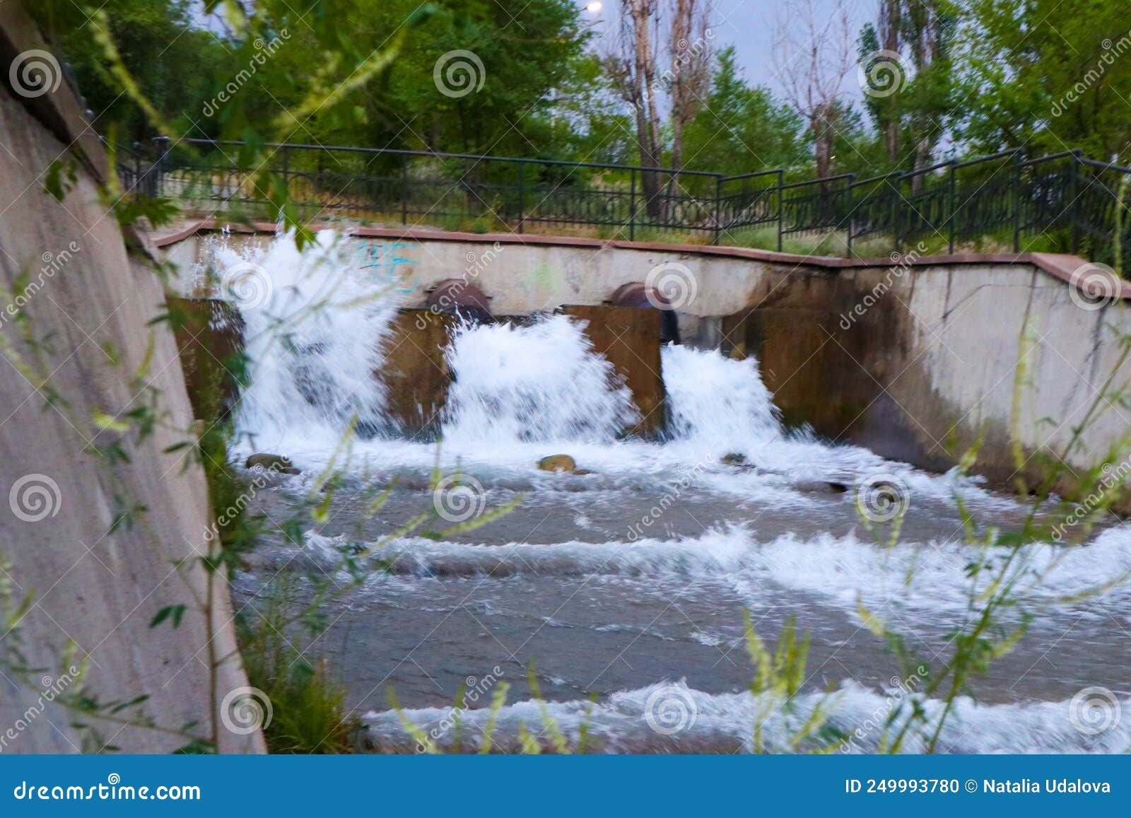 Rapid Draining of Water from the Pipe . Stock Photo - Image of canal ...