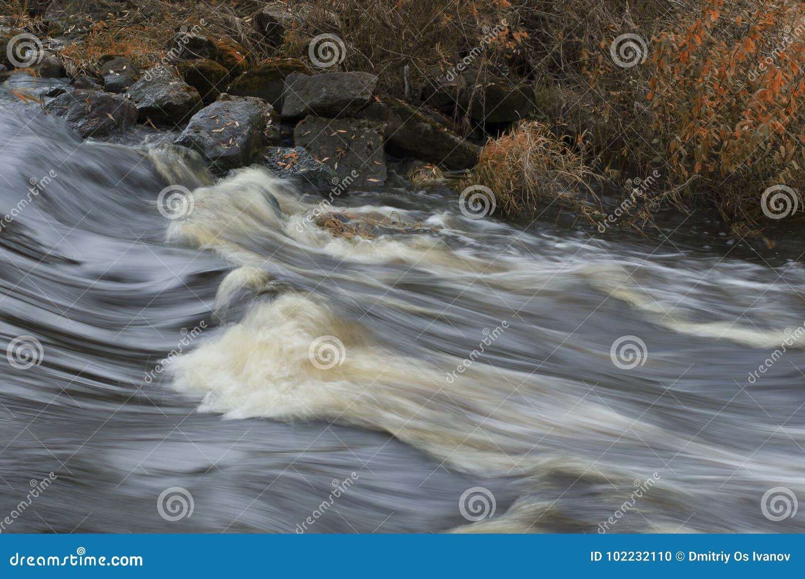 Rapid River Flow and Boulders with Fallen Leaves Stock Photo - Image of ...