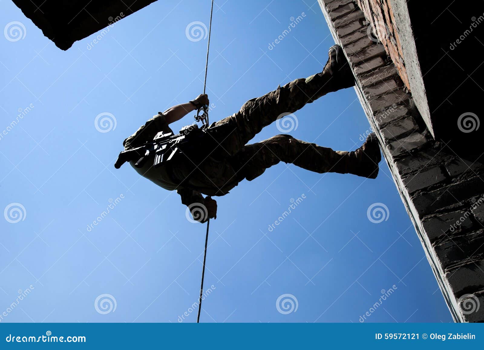 Rappeling with weapons stock image. Image of hanging - 59572121