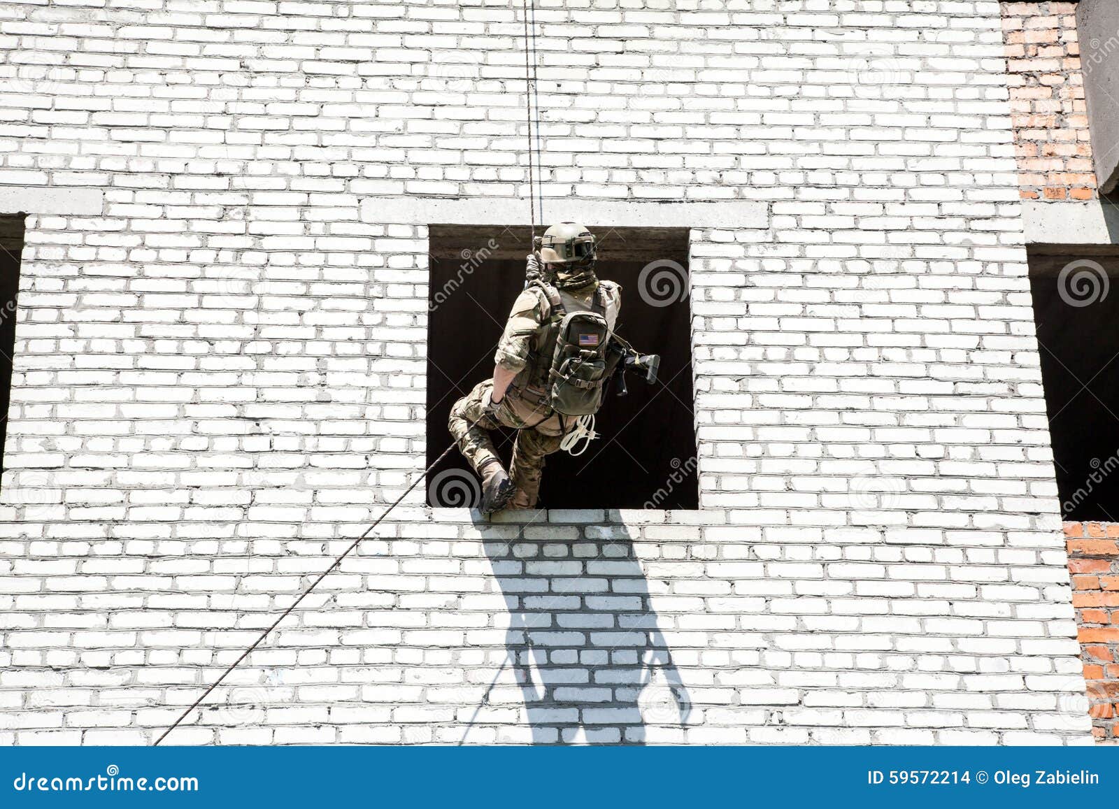 Rappeling with weapons stock photo. Image of extraction - 59572214