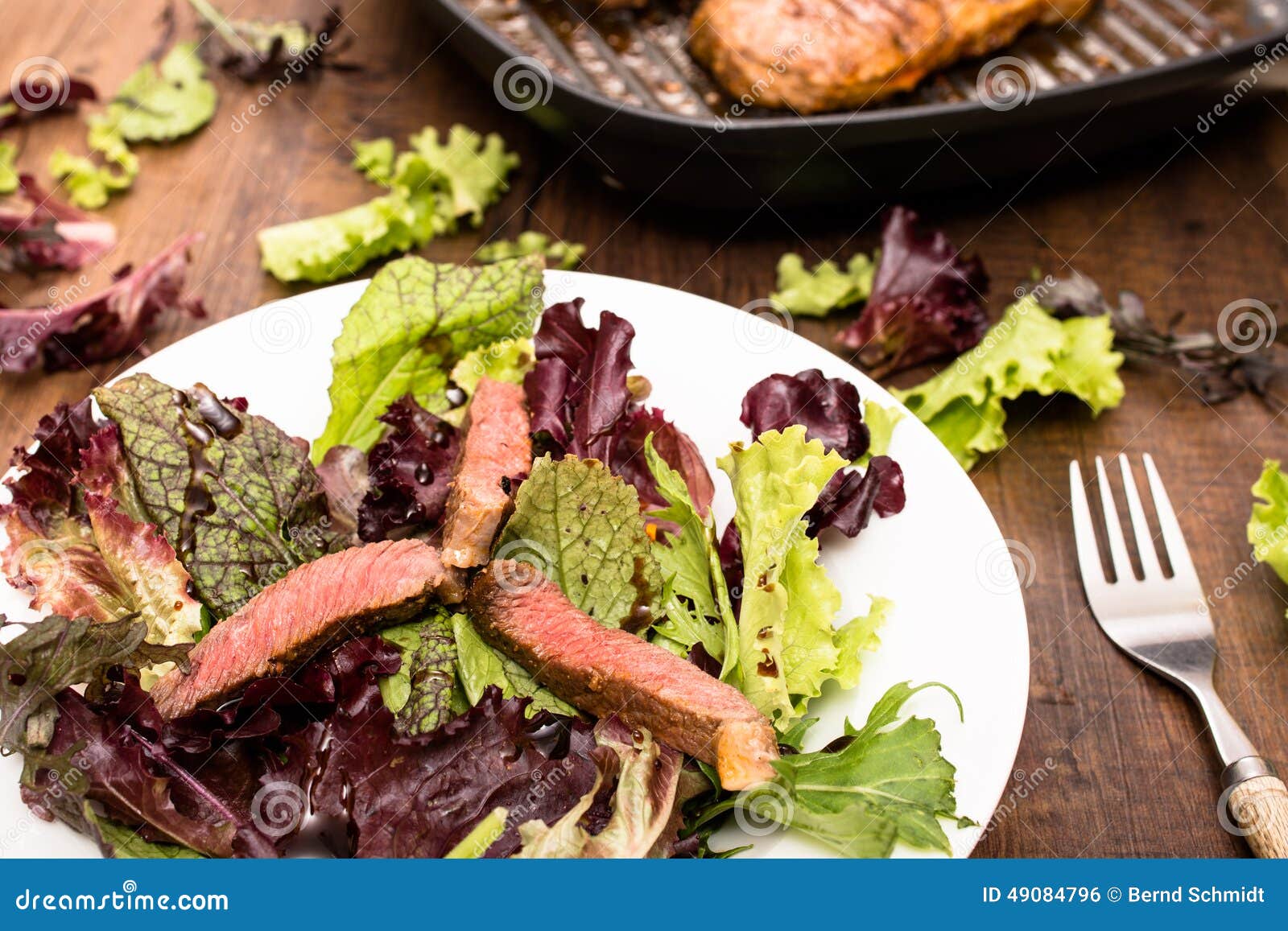 Rare Beef and Lettuce on a Plate Stock Photo - Image of steak, grill ...