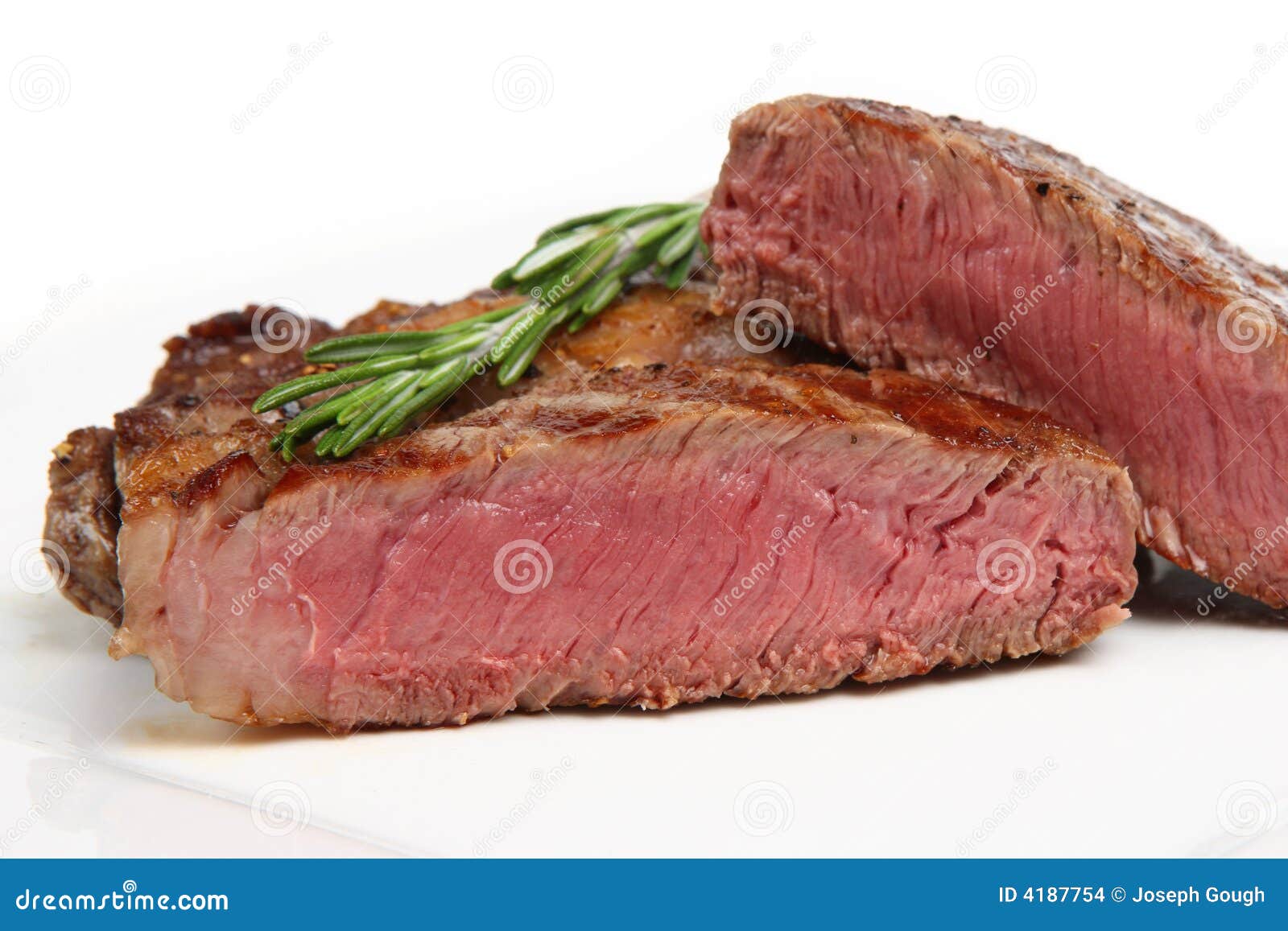 Rare Beef Rib-Eye Steak stock photo. Image of cross, garnished - 4187754